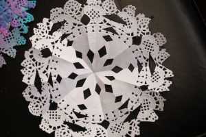 Colourful Paper Doily Snowflakes for Kids to Make - Happy Hooligans